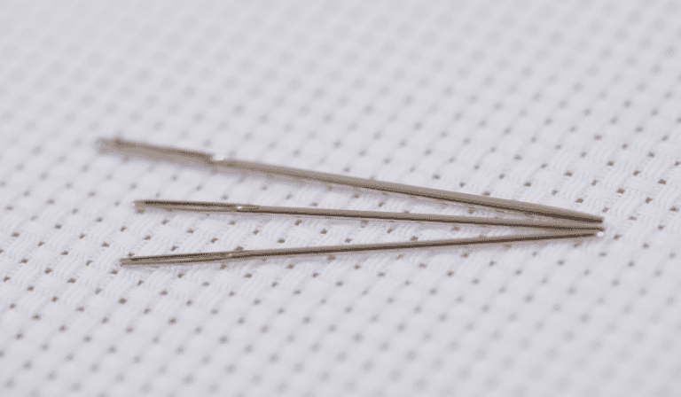 A Beginners Guide to Cross Stitch Fabric and Needles - Hailey Stitches