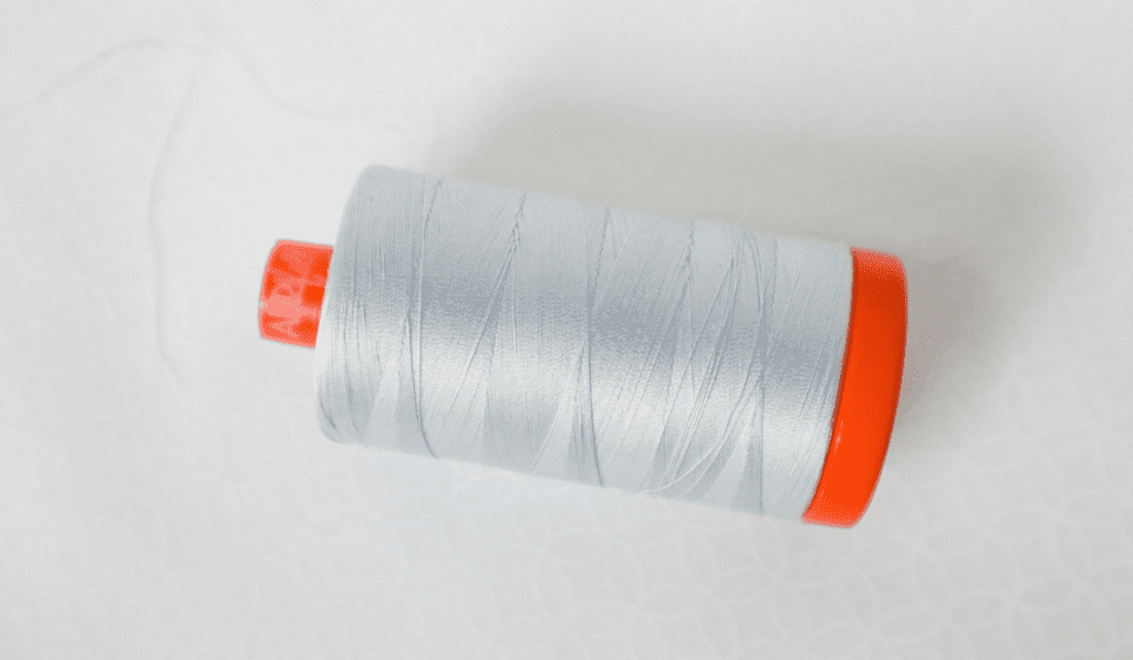 How to Thread a Singer Tradition Sewing Machine - Hailey Stitches