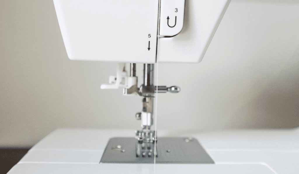 How to Thread a Singer Tradition Sewing Machine - Hailey Stitches