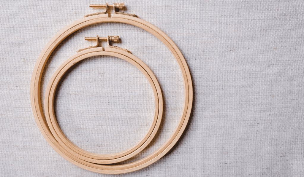 How to Finish Cross Stitch in a Hoop the Easy Way - Hailey Stitches