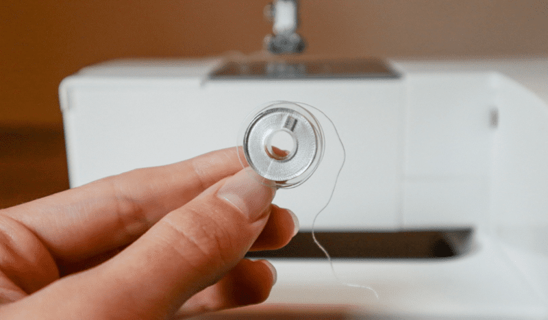 How to Wind and Insert a Bobbin into a Singer Tradition Sewing Machine ...