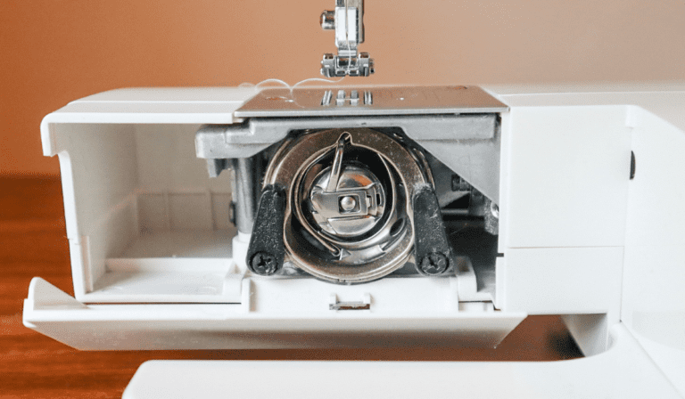 How to Wind and Insert a Bobbin into a Singer Tradition Sewing Machine ...