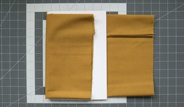 How to Fold Fabric on Comic Book Boards - Hailey Stitches