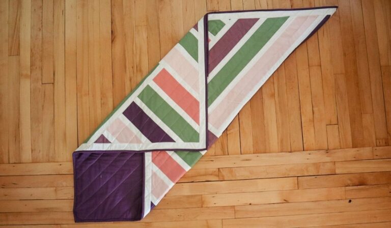 How to Fold a Quilt for Storage - Hailey Stitches