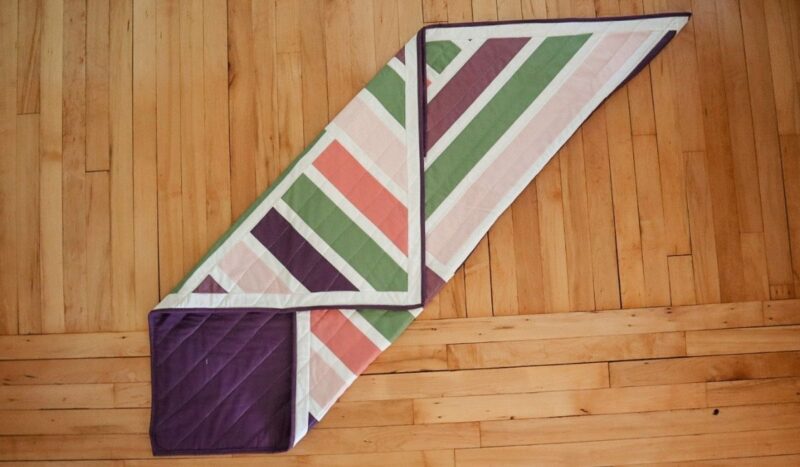 How to Fold a Quilt for Storage - Hailey Stitches
