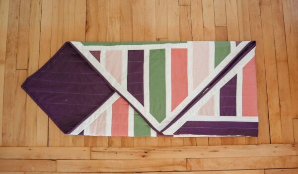 How to Fold a Quilt for Storage - Hailey Stitches