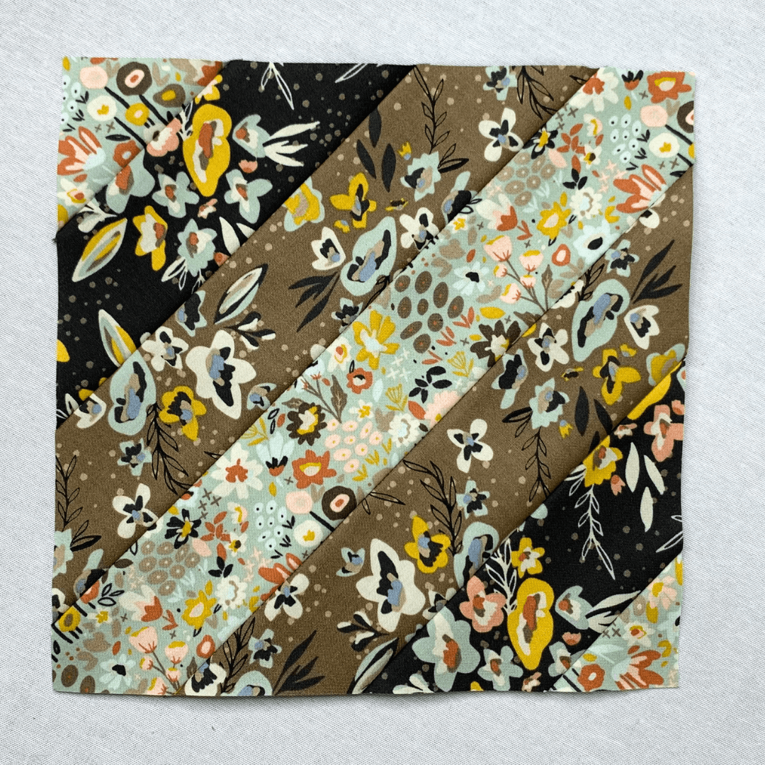 10 Eye-Catching Quilt Blocks Made Using Jelly Roll Strips - Hailey Stitches